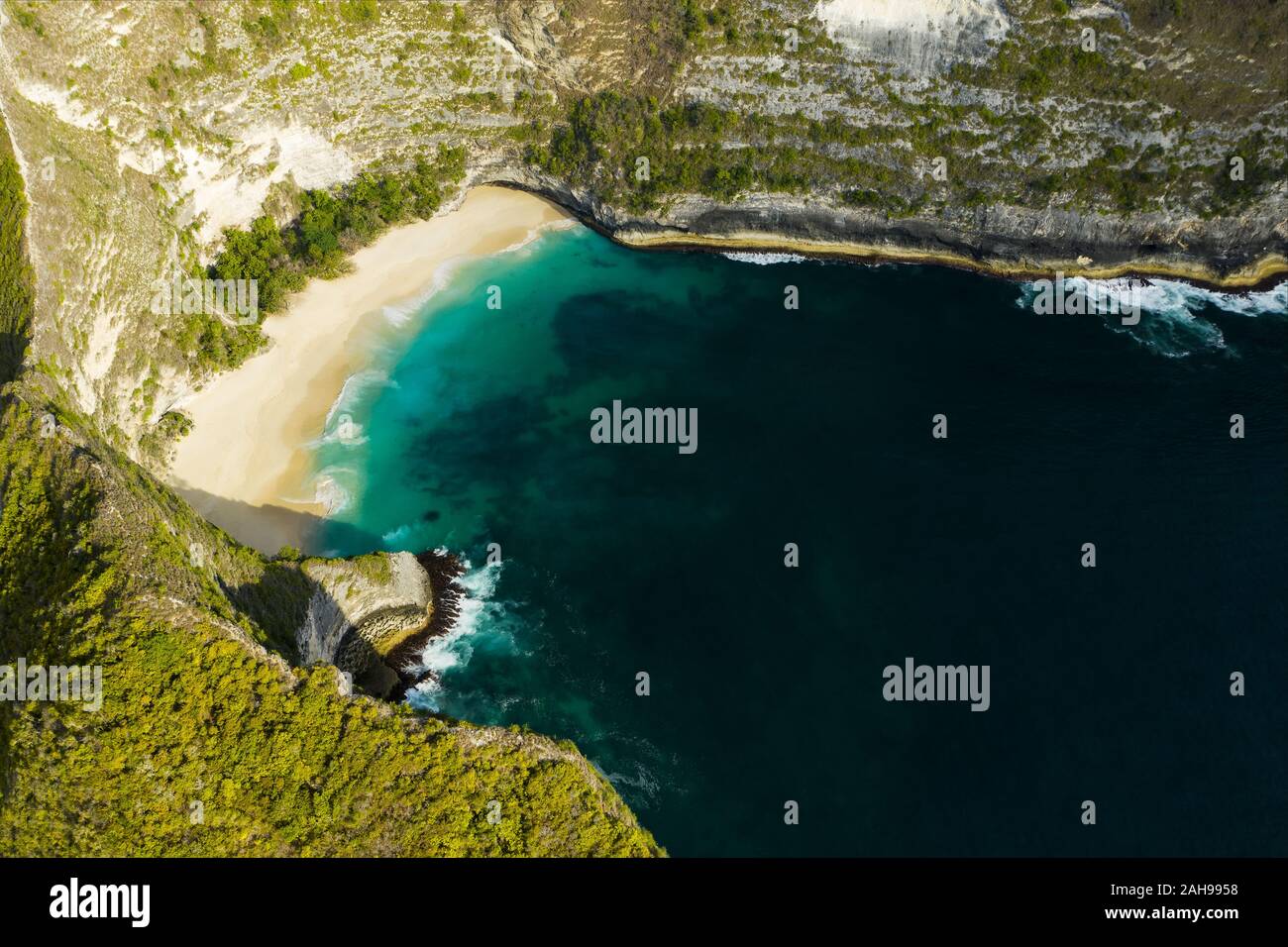Stunning aerial view of a T-Rex shaped cliffs with the beautiful ...