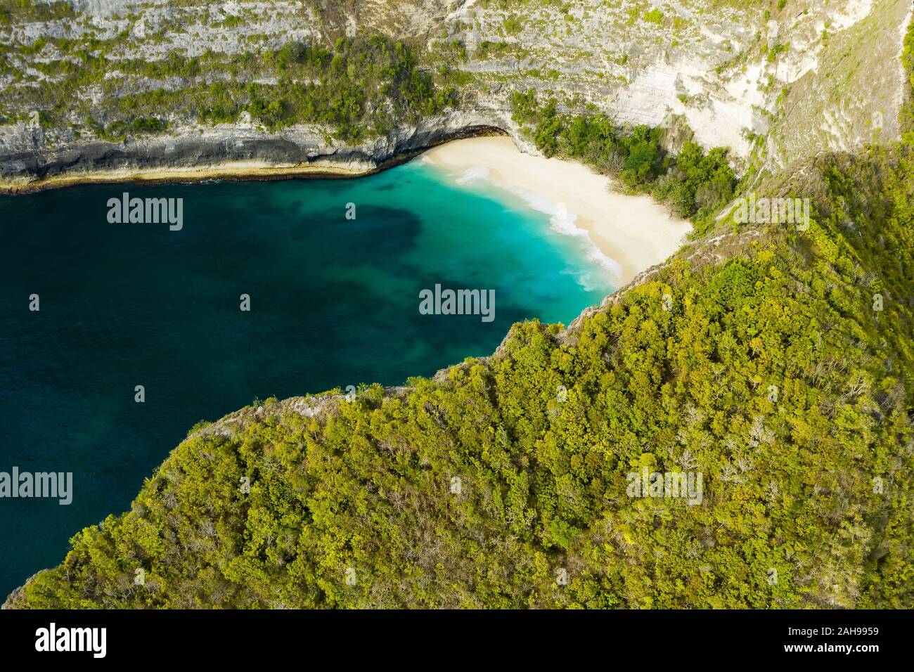 Stunning aerial view of a T-Rex shaped cliffs with the beautiful ...