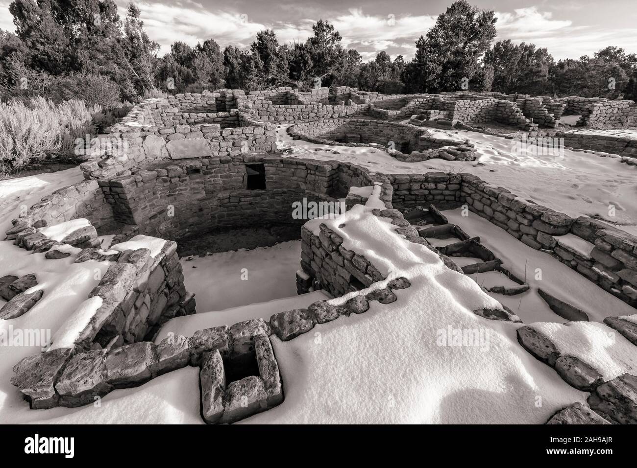 Snow surrounds the remains of mesa top Coyote Village on Chapin Mesa in ...