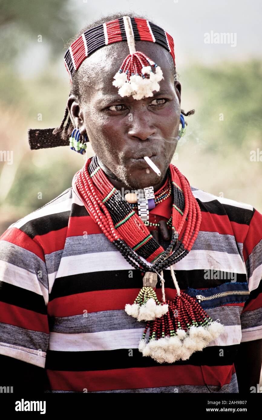 Hamar tribe man smoking, lower Omo valley - Ethiopia Stock Photo - Alamy