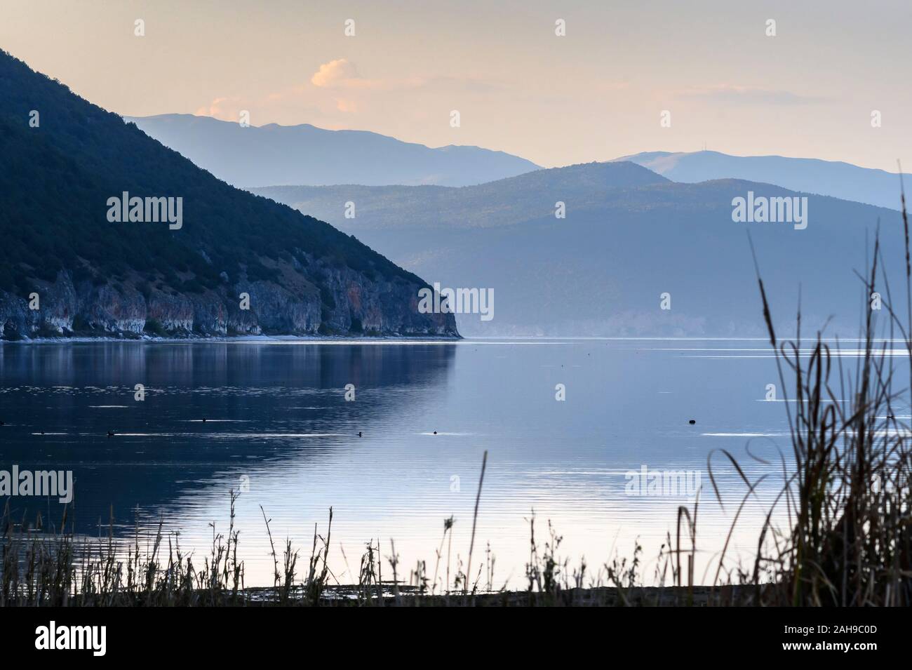 Evening light on Lake Prespa between the villages of Lemos and Psarades ...