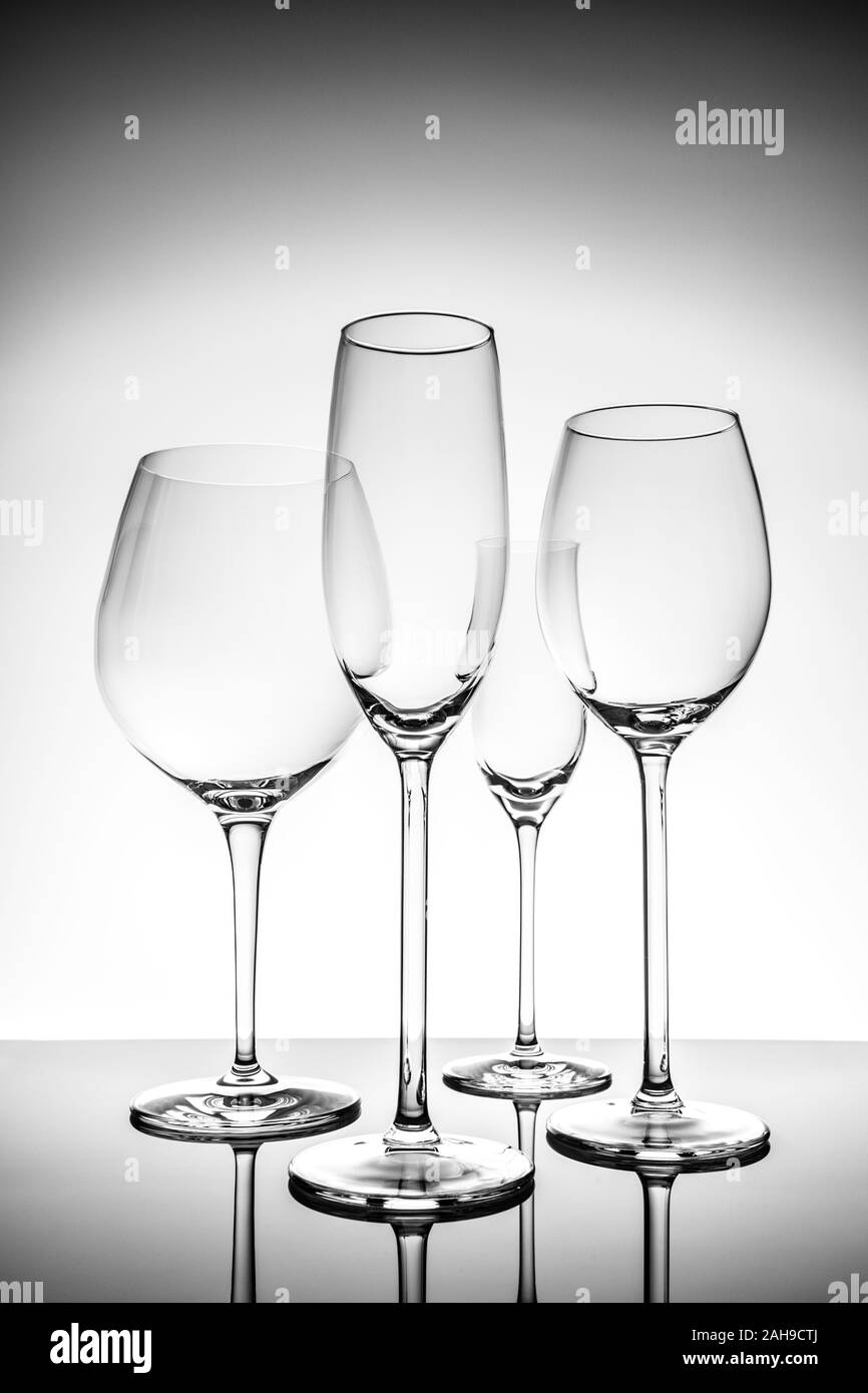 Glassware selection with wine, champagne and liquour glasses on the ...