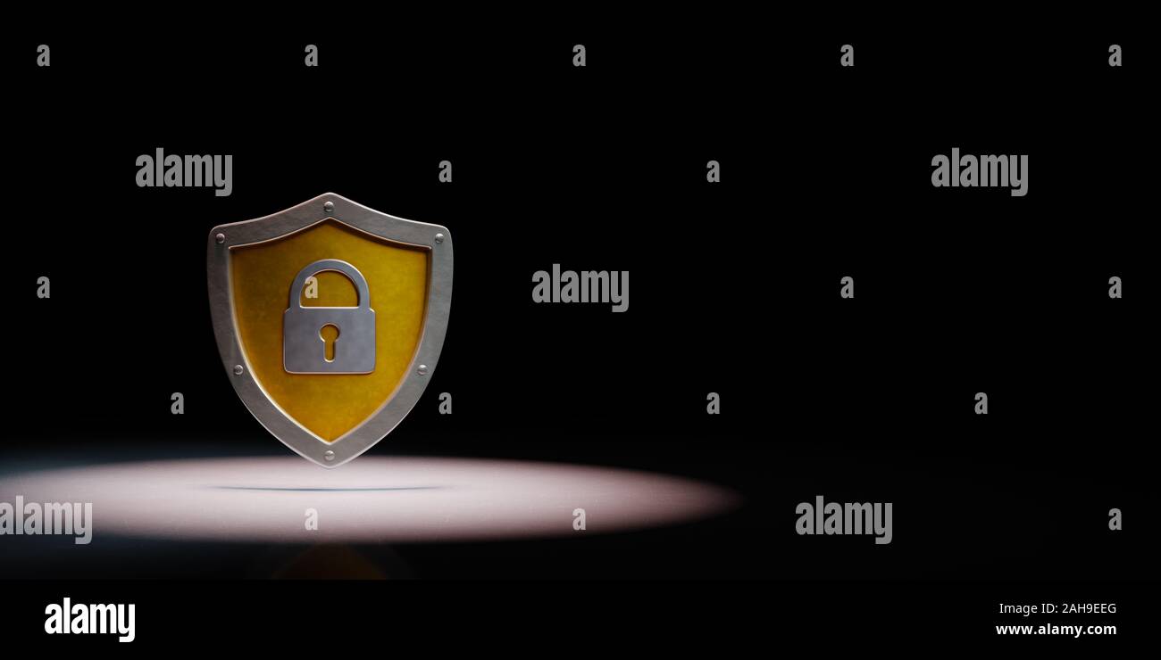 Metallic Shield Shape with Padlock Spotlighted on Black Background ...