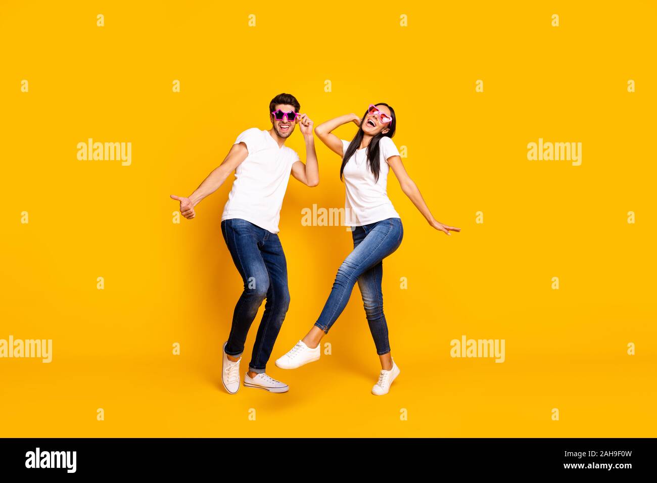 Full body photo of two people dancing at first season theme party wear ...