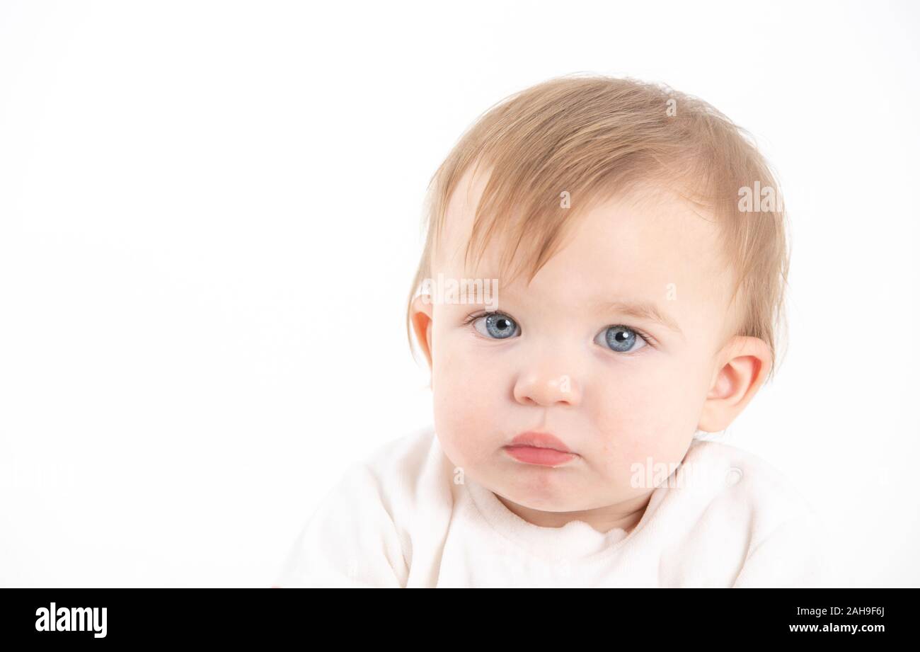 Stock studio photo with the white background of a baby's face Stock ...
