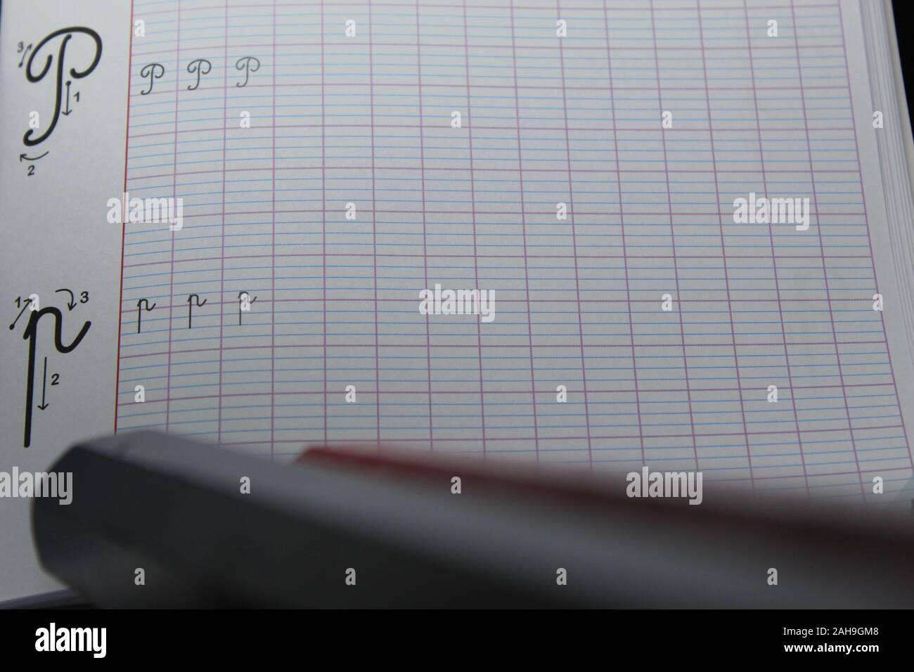 French Lines of Letters on French Ruled Paper Stock Photo - Alamy