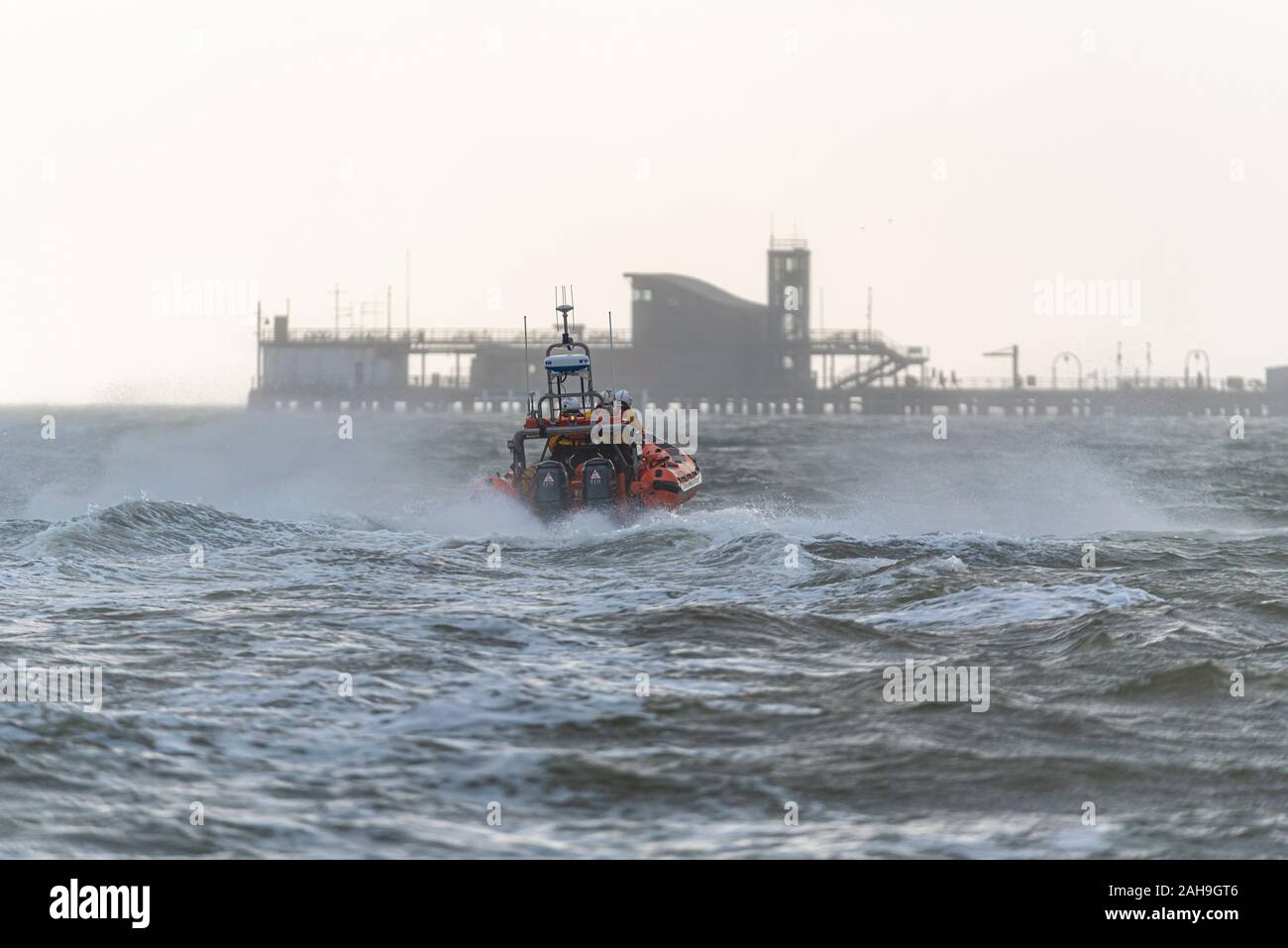 RNLI lifeboat underway at speed on the Thames Estuary at Southend on ...