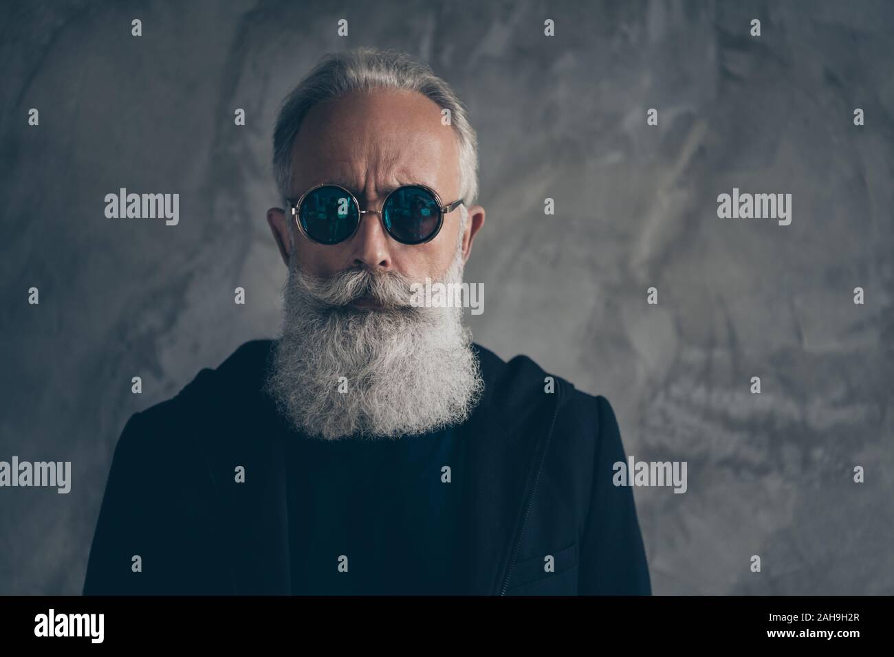 Close up photo of dreamy harsh masculine man staring with eyewear ...