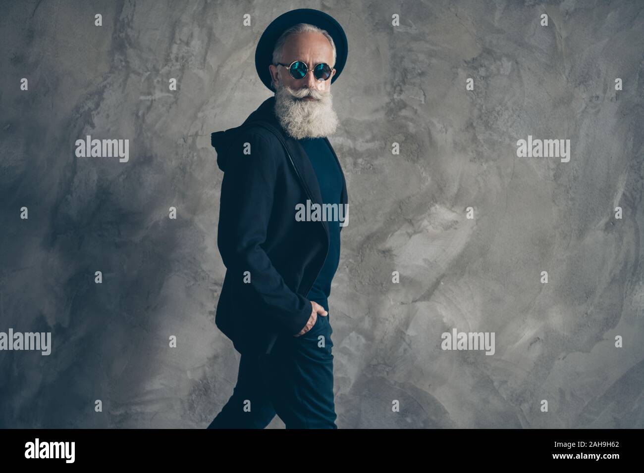 Profile side photo of old attractive harsh masculine man walking with ...