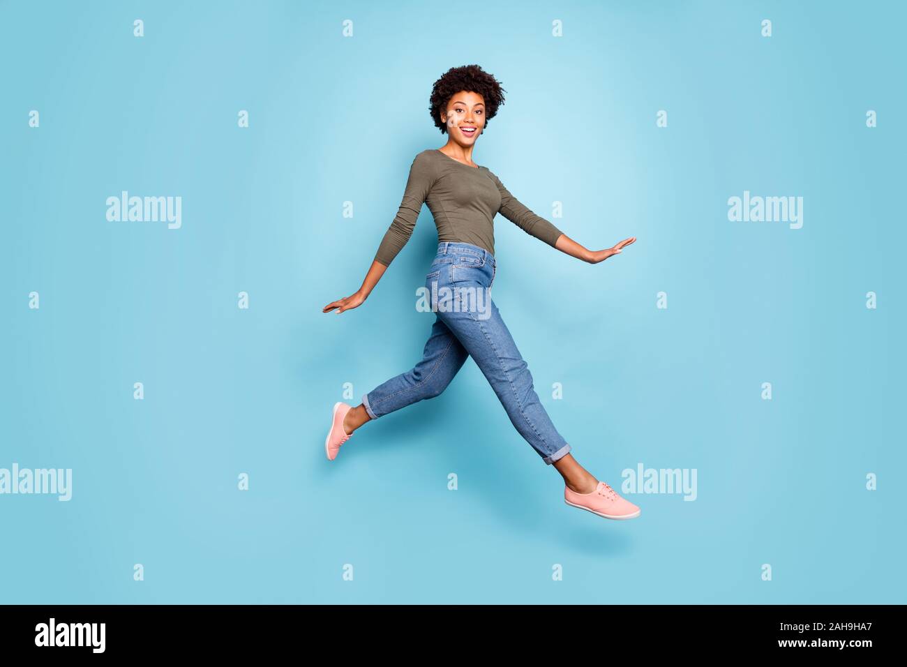 Full body photo of dark skin pretty lady jumping high walking down ...