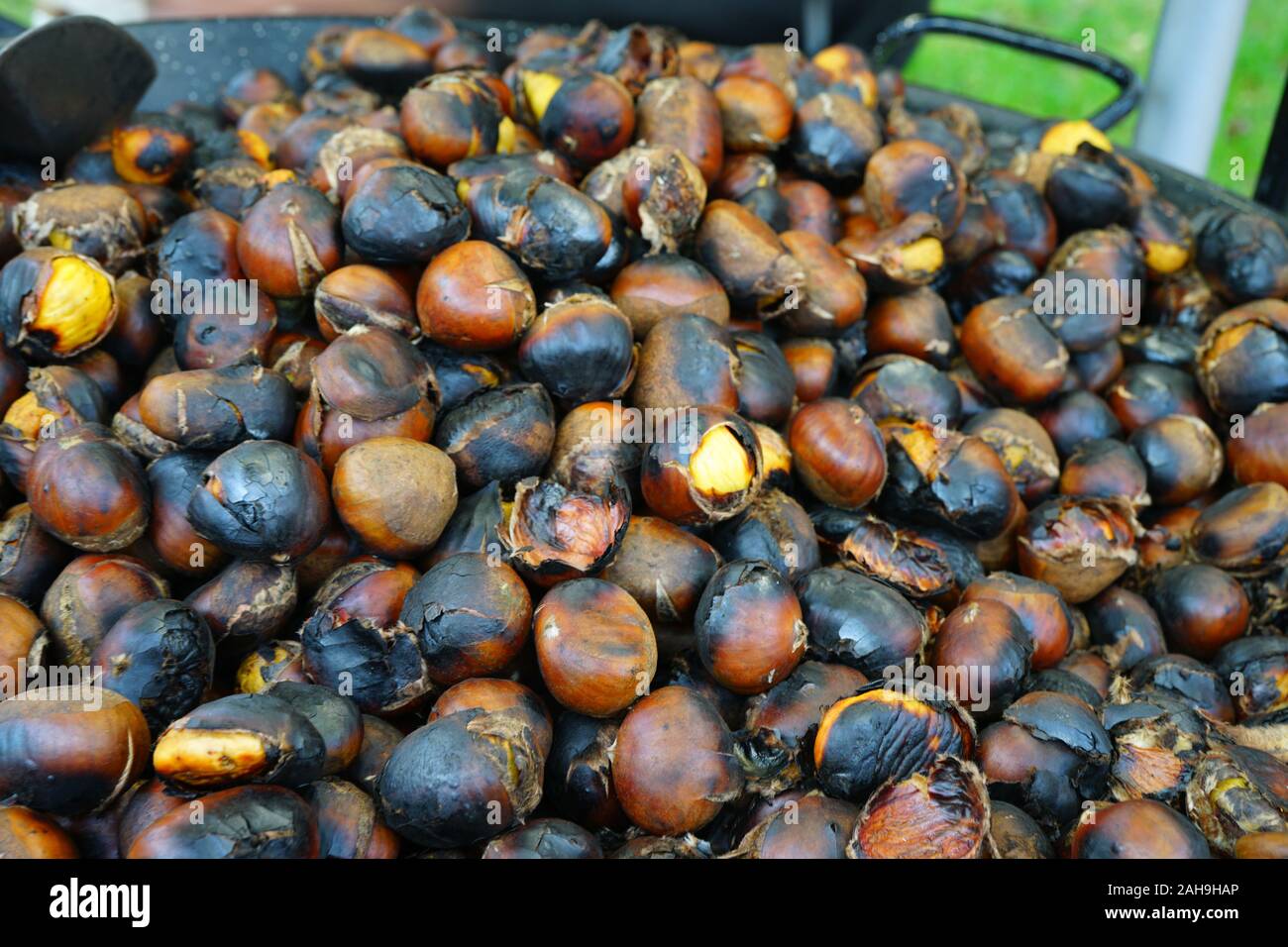 Roasted chestnuts in a pan for sale in the street in Paris Stock Photo ...