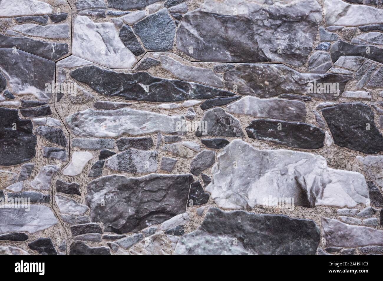 The pebble stone floors and wall, background textures. Cold color tones ...