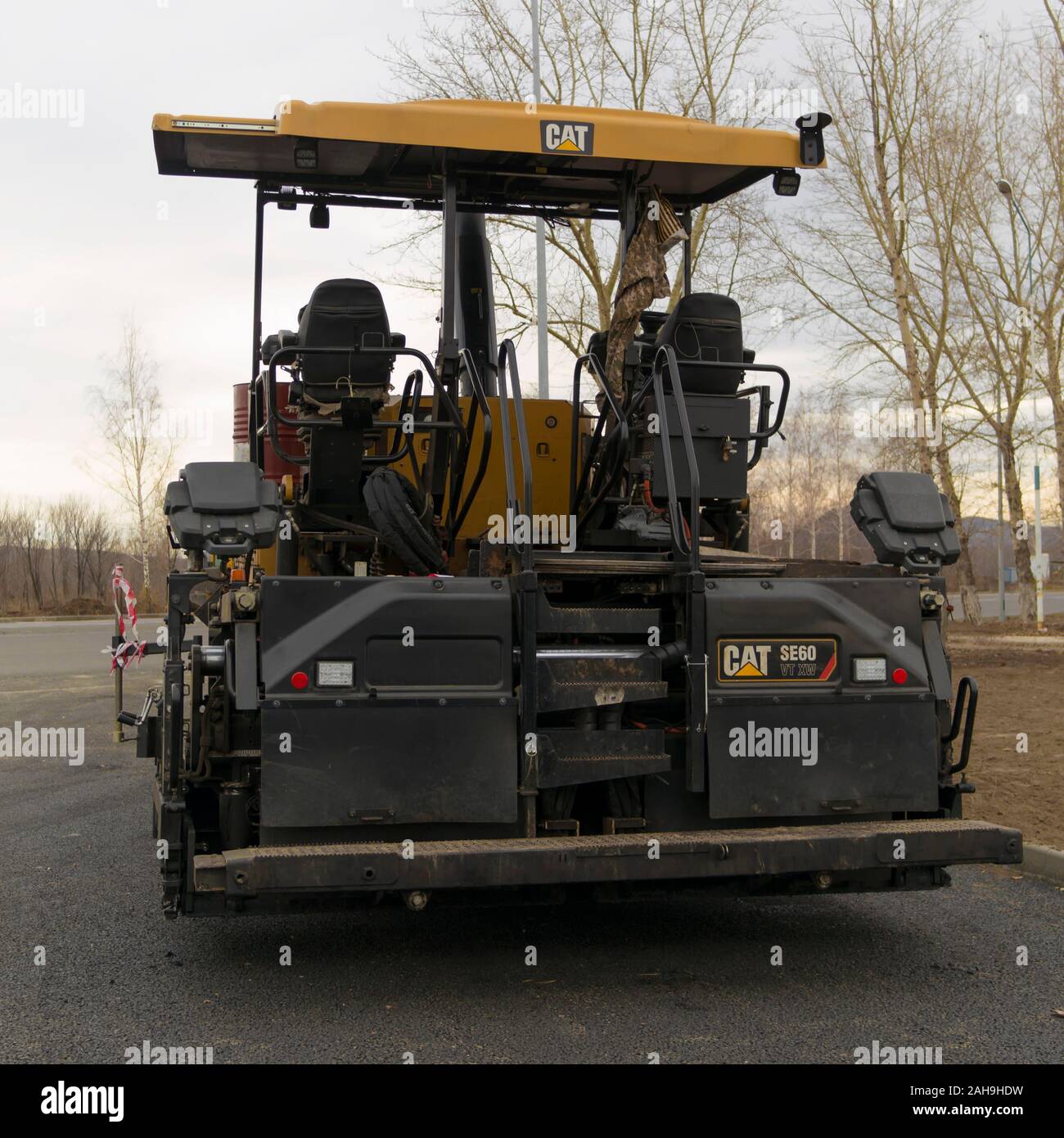 Dirty caterpillar asphalt paving hi-res stock photography and images ...