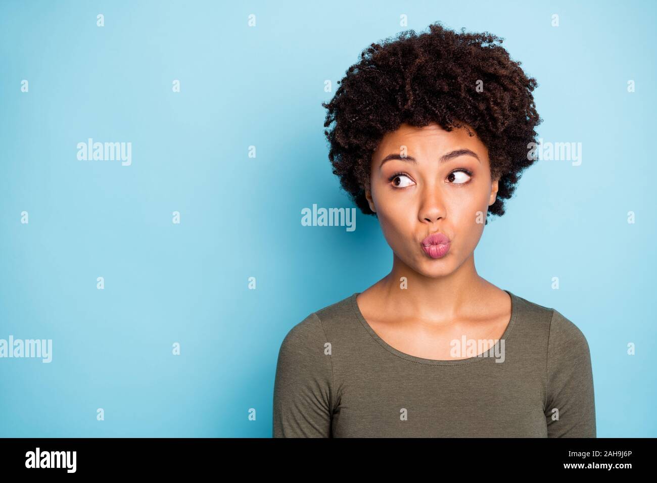 Portrait of negative anxious dark skin girl with lips pouted plump look ...