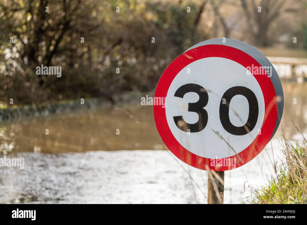 Road signs under water due to Flooding after heavy rain at Alfriston ...