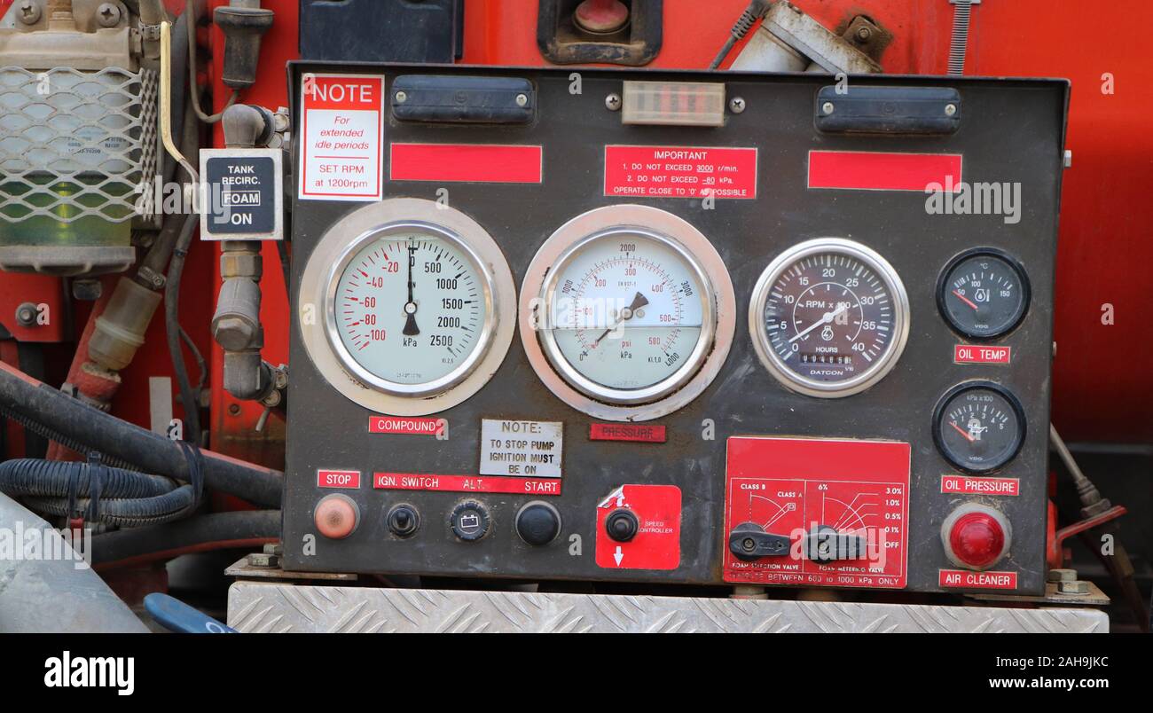 fire truck controls with gauges and switches Stock Photo - Alamy