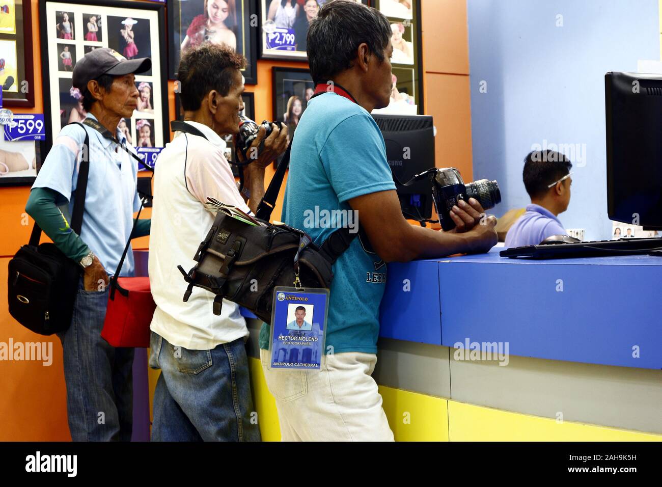 Antipolo City, Philippines – December 21, 2019: Photographers line up ...