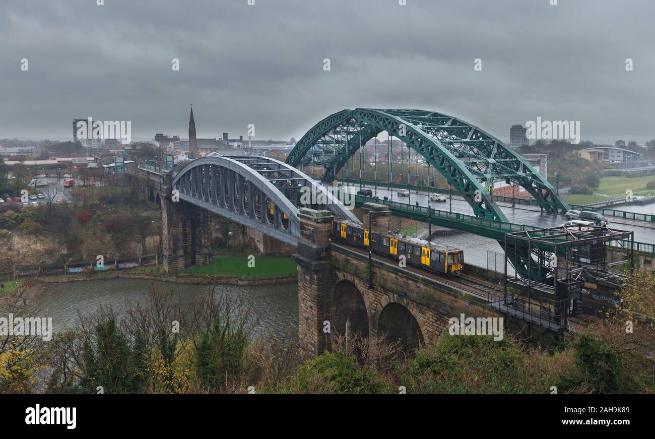 Nexus Tyne and Wear metro crossing the Monkwearmouth Bridge, Sunderland ...