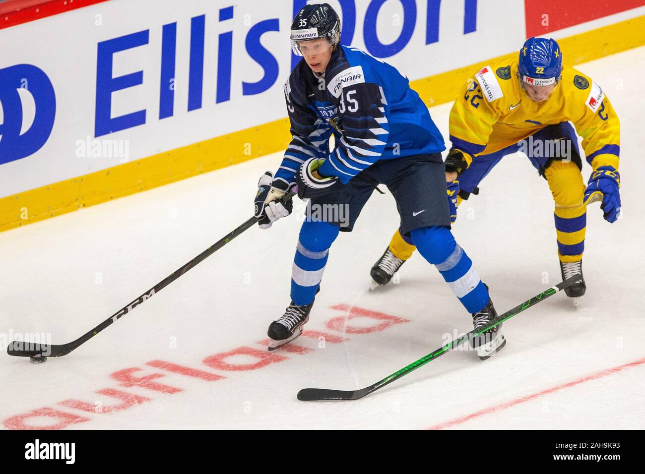 L-R Aku Raty (FIN) and Karl Henriksson (SWE) in action during the 2020 IIHF World Junior Ice ...