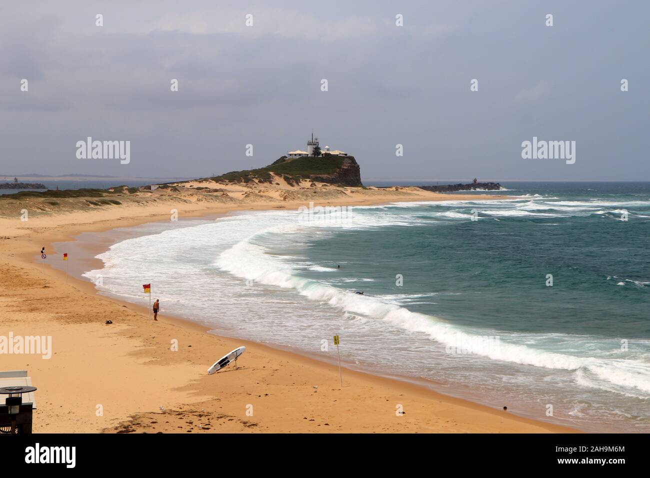 Nobbys head at newcastle with long surf beach in foreground Stock Photo ...