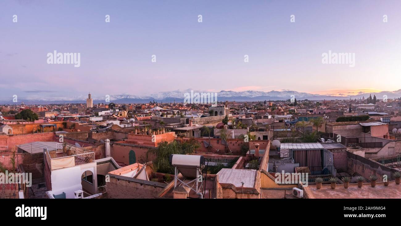 Marrakech city skyline in Medina area, with Atlas mountains behind, at ...