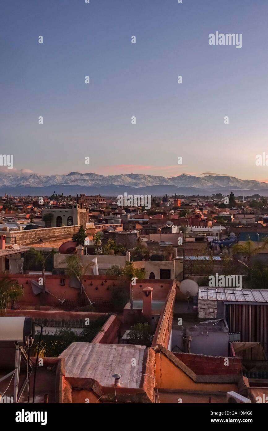 Marrakech city skyline in Medina area, with Atlas mountains behind, at ...
