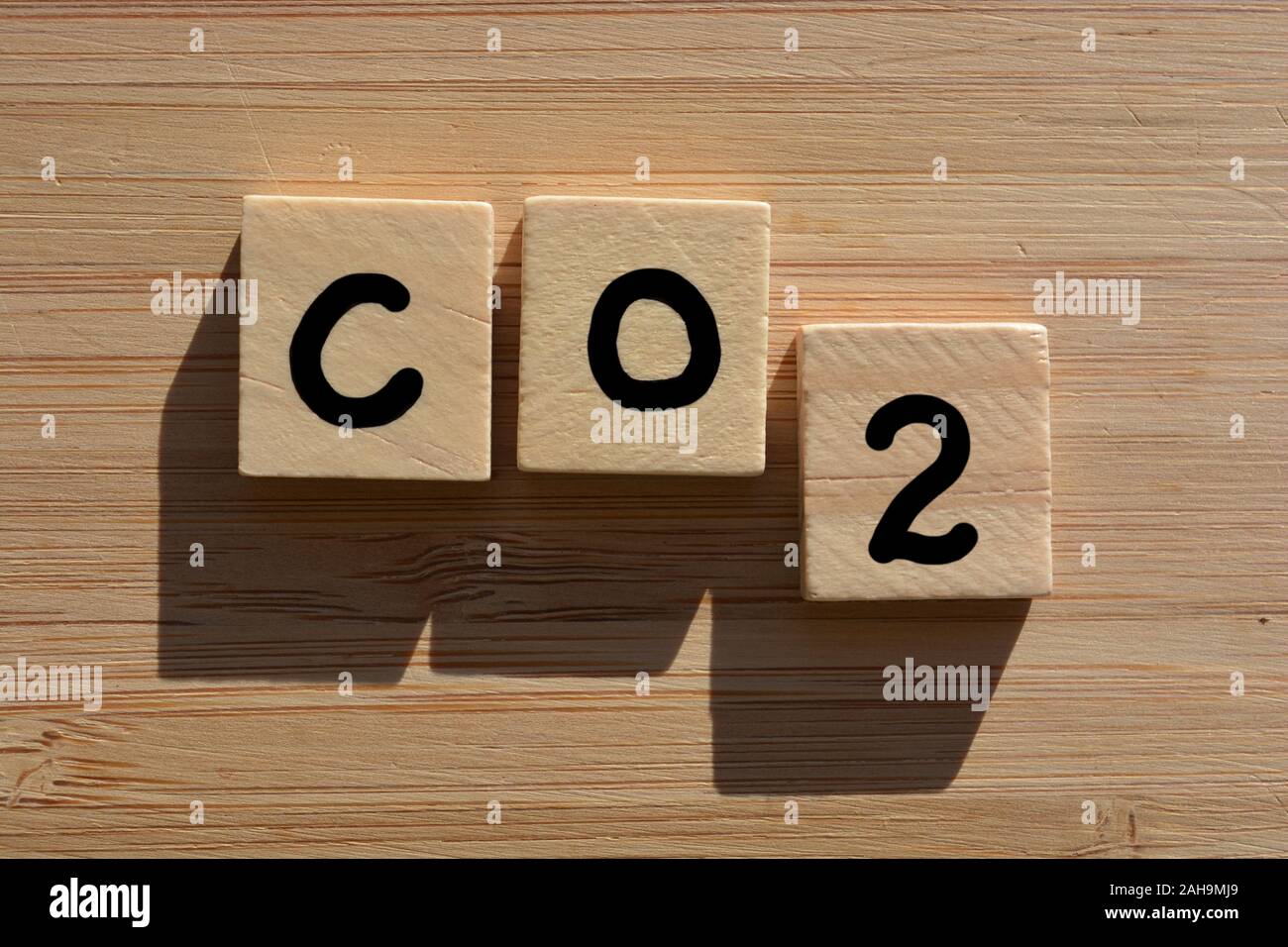 CO2 in wooden alphabet letters on a bamboo wood background Stock Photo ...