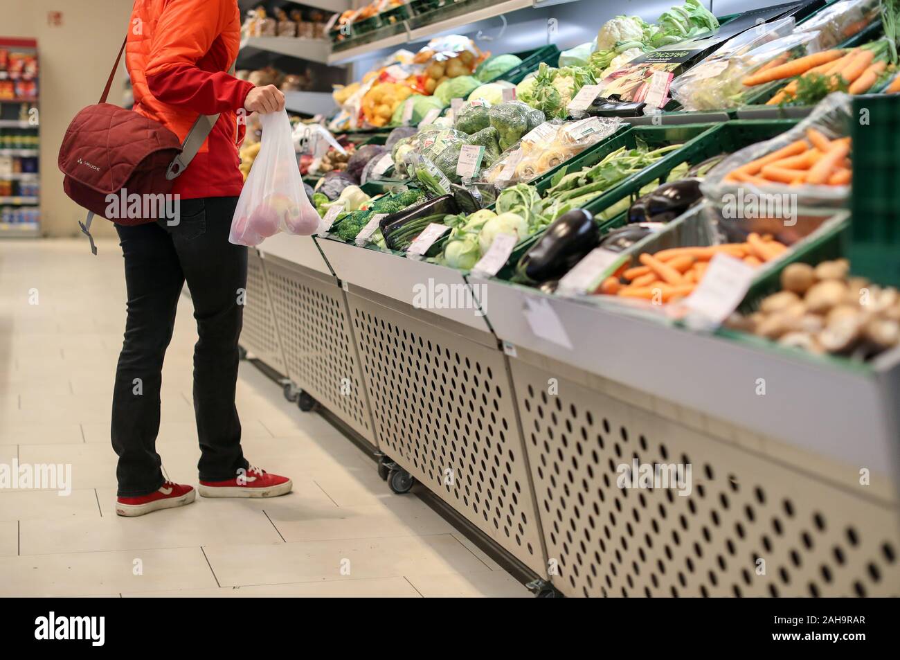 Leipzig, Germany. 15th Nov, 2019. A customer stands in a "Konsum ...