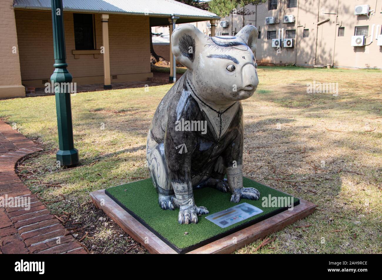 koala statue on pedestal painted to look like a convict Stock Photo - Alamy