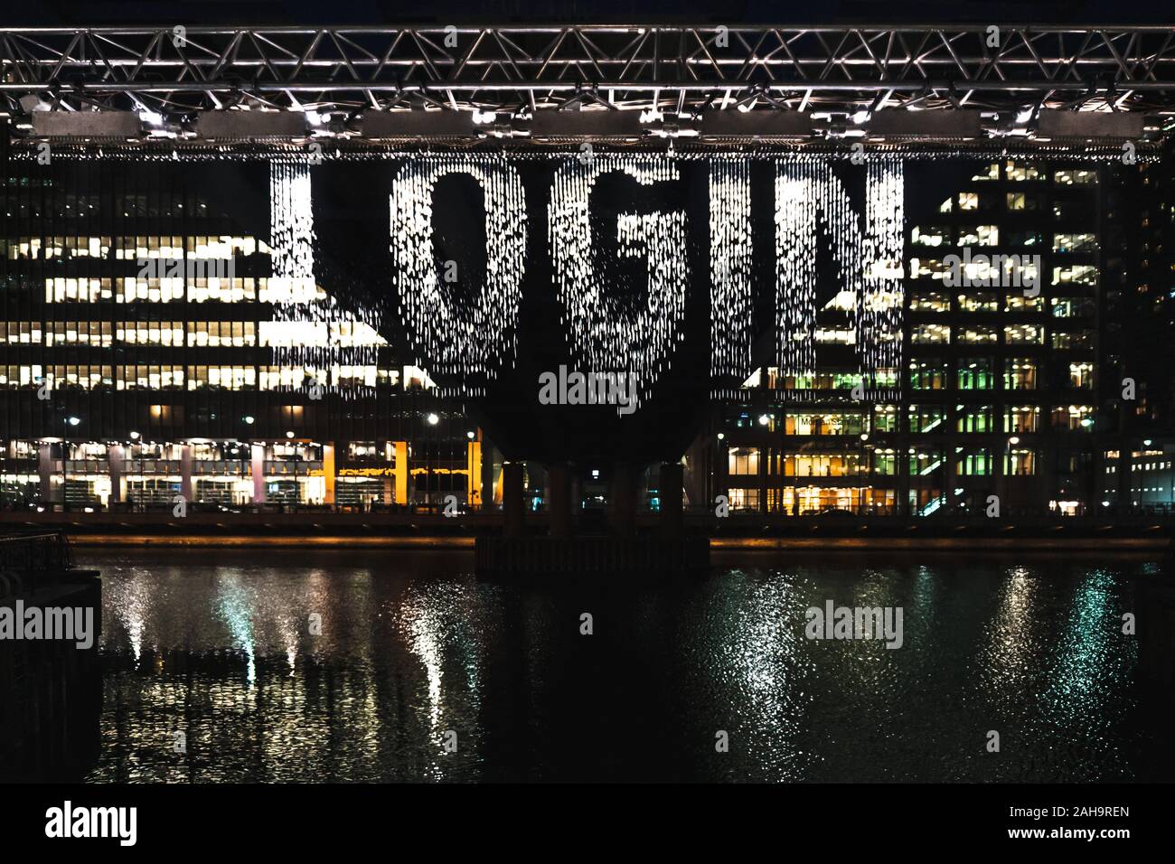 LOG IN sign written on falling water Stock Photo - Alamy