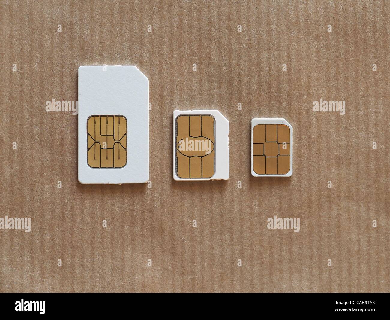 Mini, micro and nano sims for mobile phone Stock Photo - Alamy