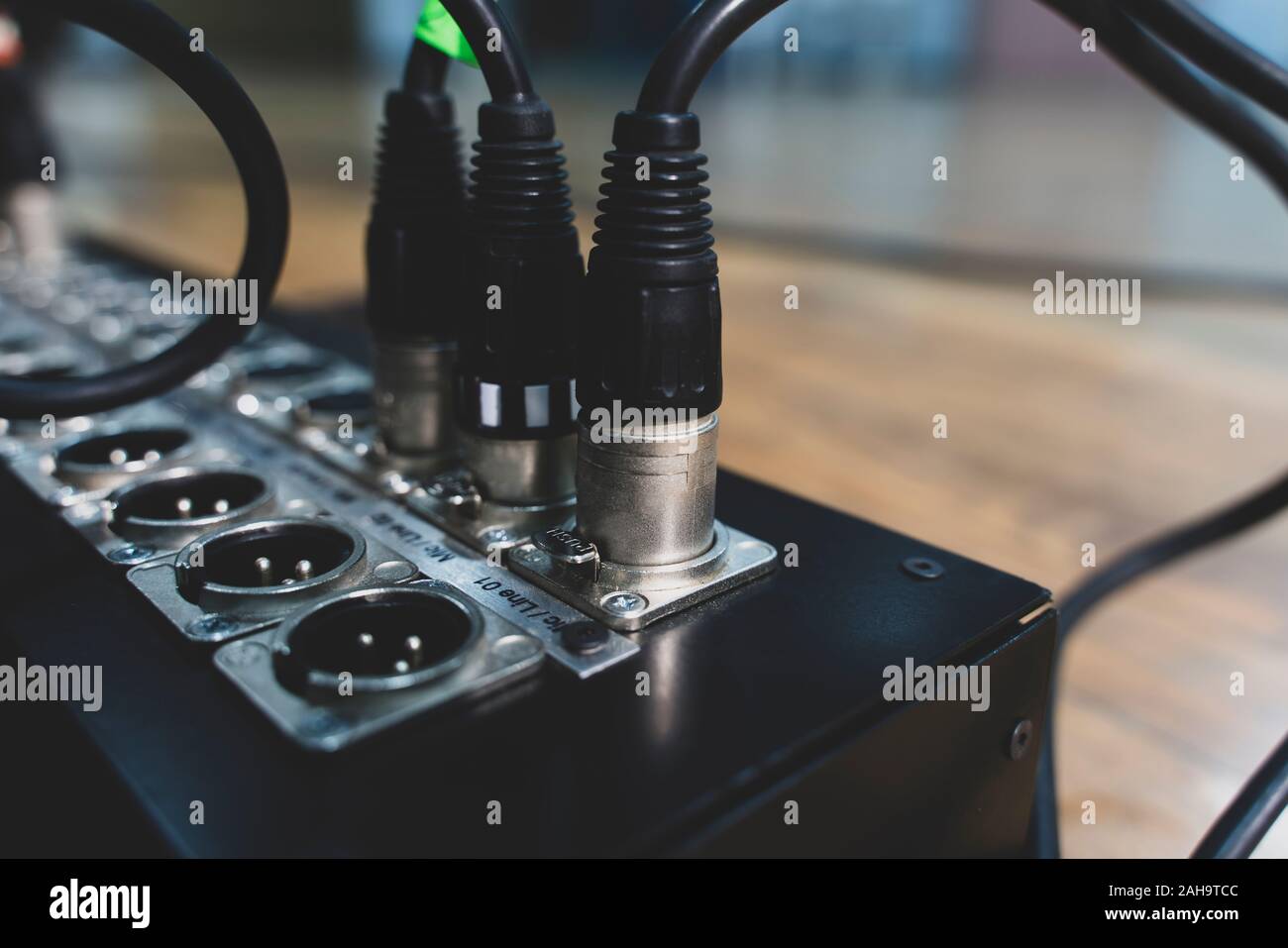 Audio snake and stage box with xlr cables and jacks at a live event ...