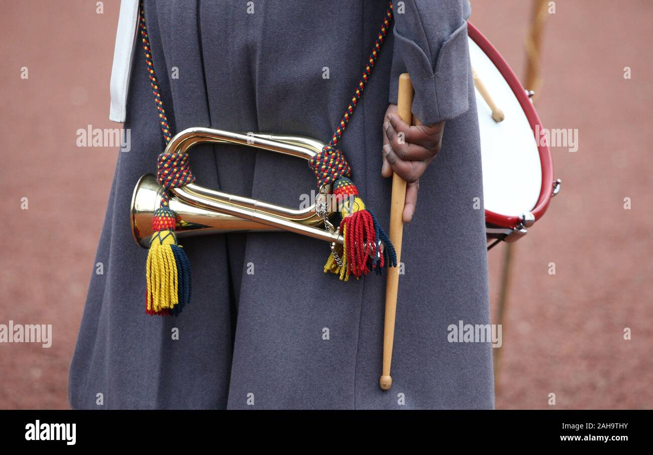 A musician from the Band of the Grenadier Guards stands at ease during ...