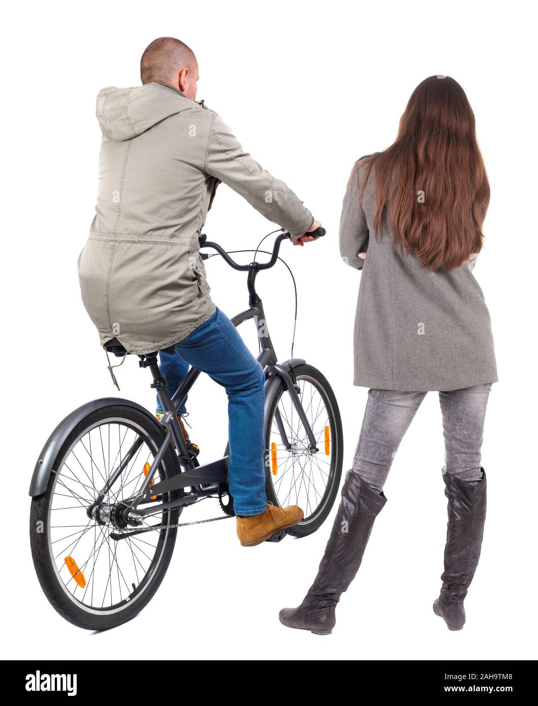 Woman riding bike back view Cut Out Stock Images & Pictures - Alamy