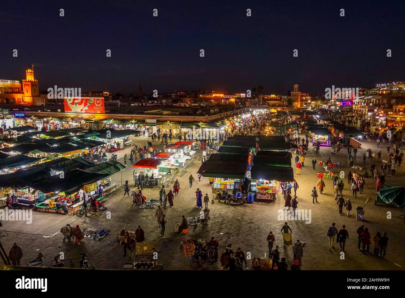 Jemaa el-Fna. Food stalls and crowds at Jemaa El Fna Square at night ...