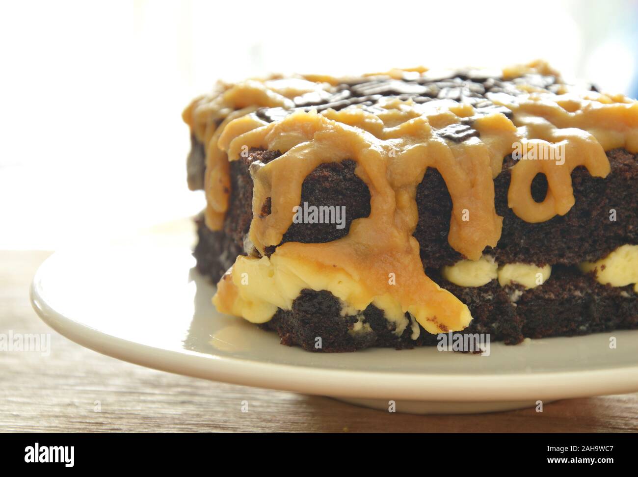chocolate butter cake dressing brown sweet caramel cream on plate Stock ...