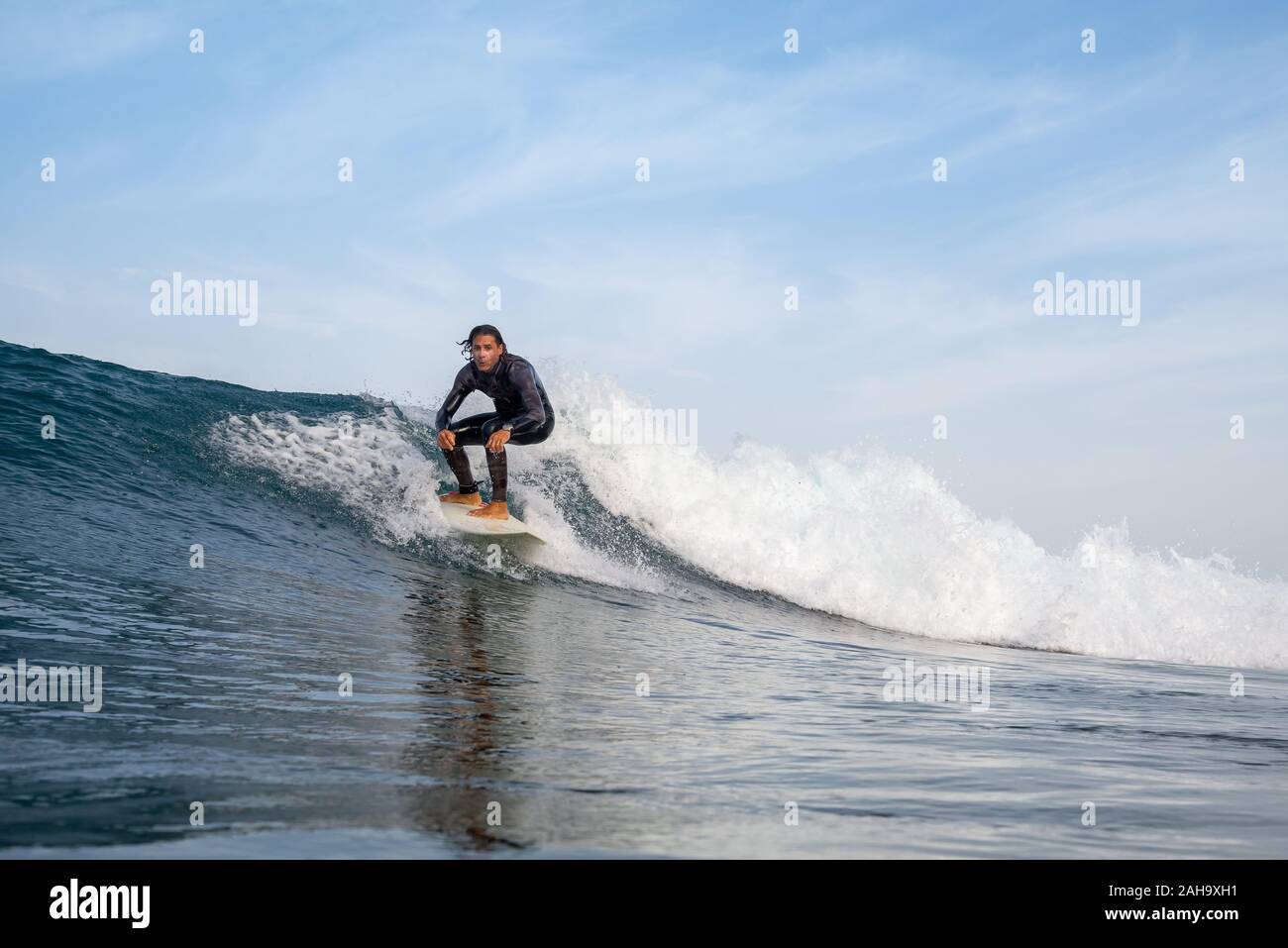 surfer riding waves on the island of fuerteventura Stock Photo - Alamy