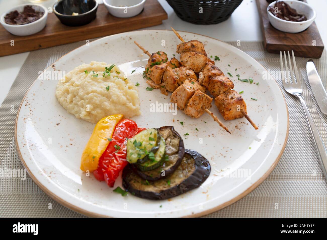 A chicken kebab among Cypriot food served at Limassol in Cyprus. The ...
