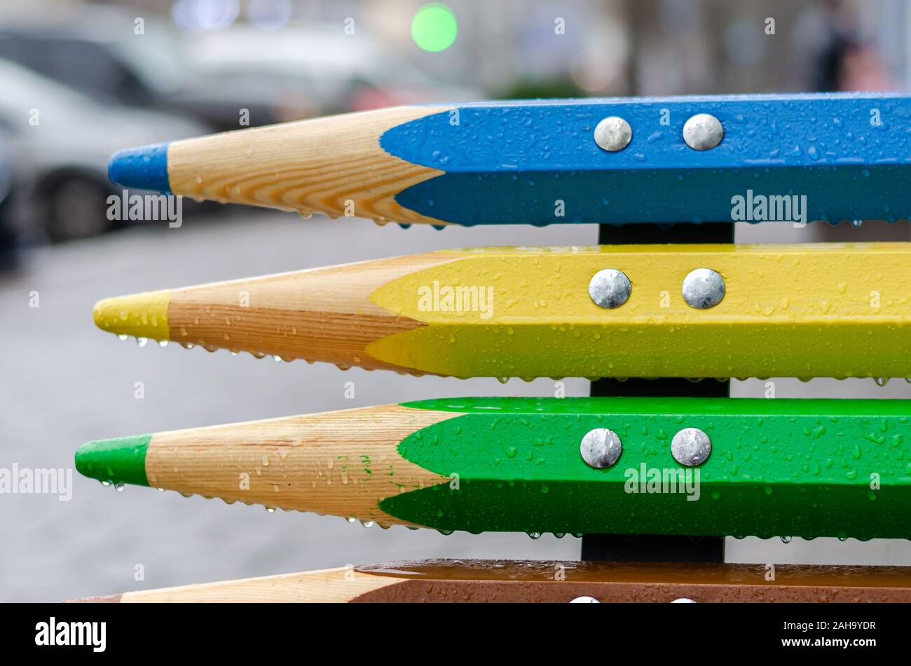 Part of the back of a street bench made of colorful pencils. Bench ...