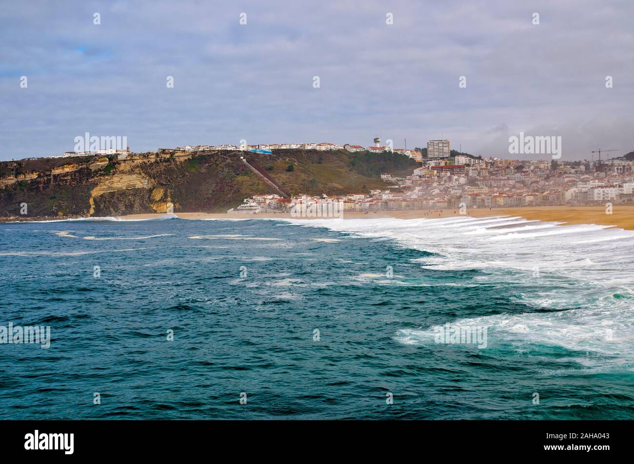 Atlantic ocean seascape with the cliff and shore of Nazare, Portugal ...