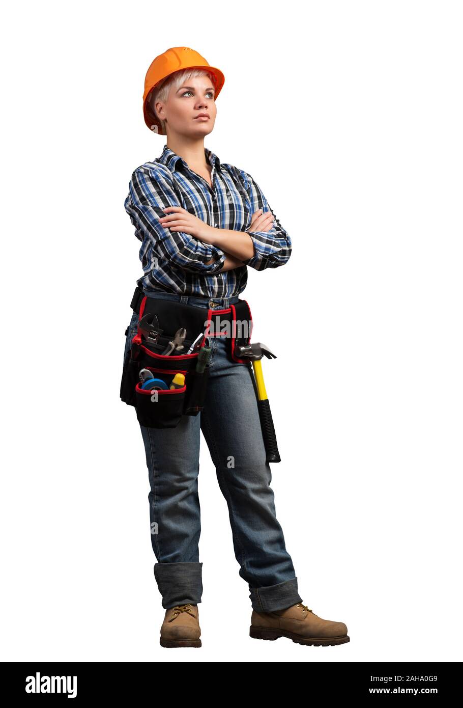 Attractive female construction worker in hardhat standing with folded ...