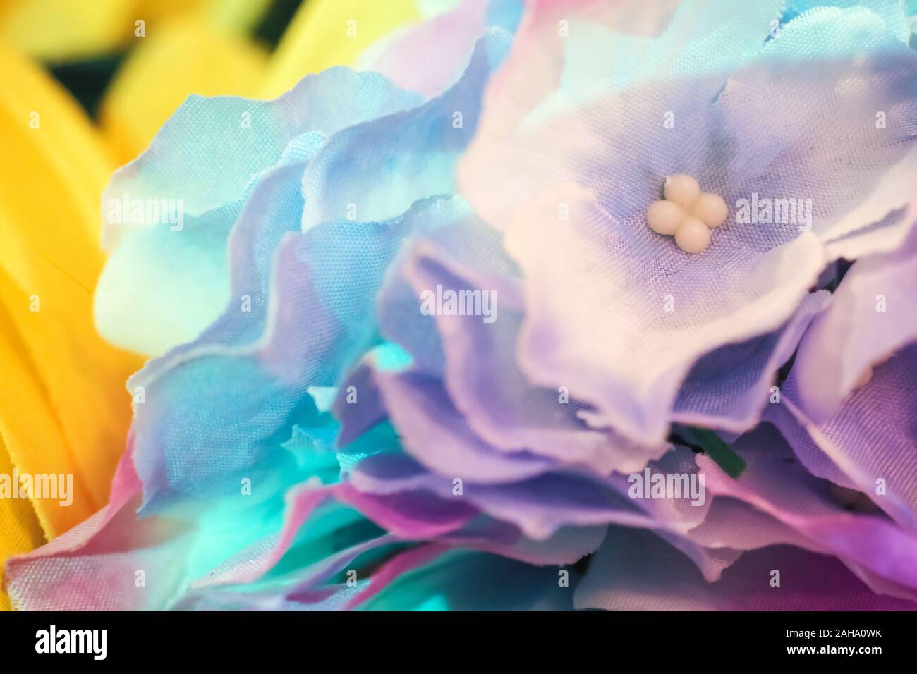 Colorful silk artificial flowers background Stock Photo - Alamy