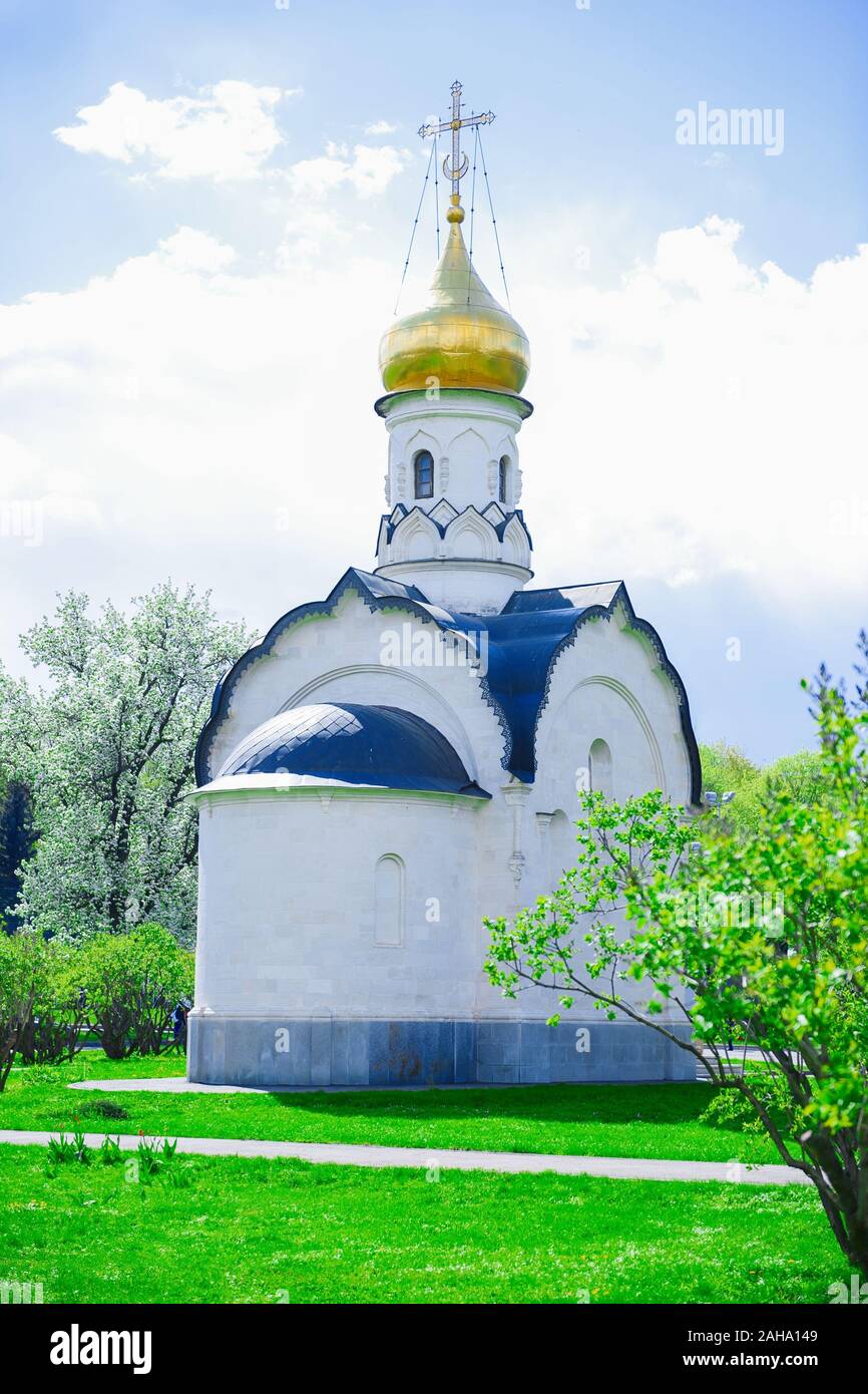 Orthodox white chapel in Moscow park in Russia background Stock Photo ...