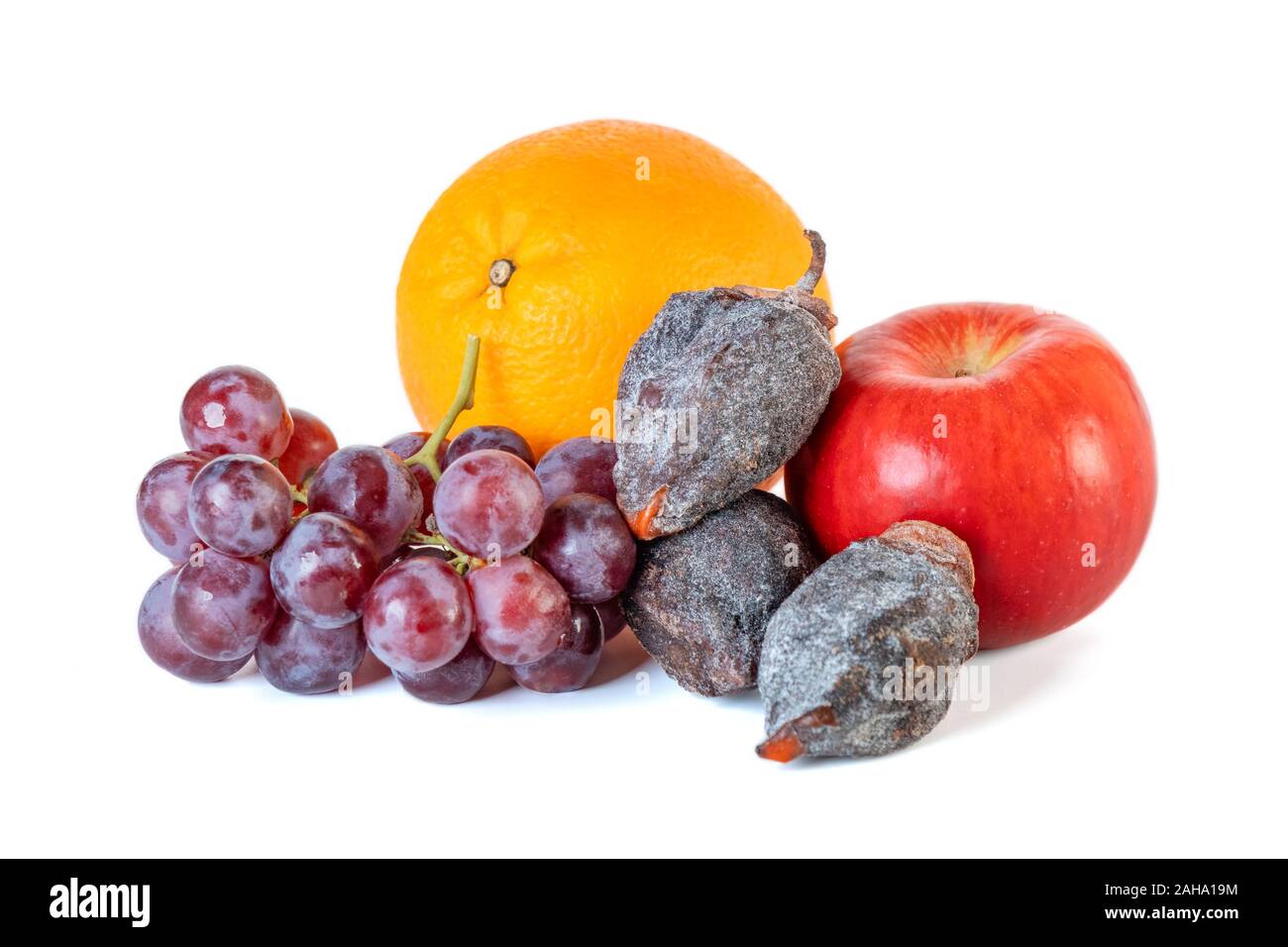 Grape, apple, orange and dry persimmon isolated on white background ...