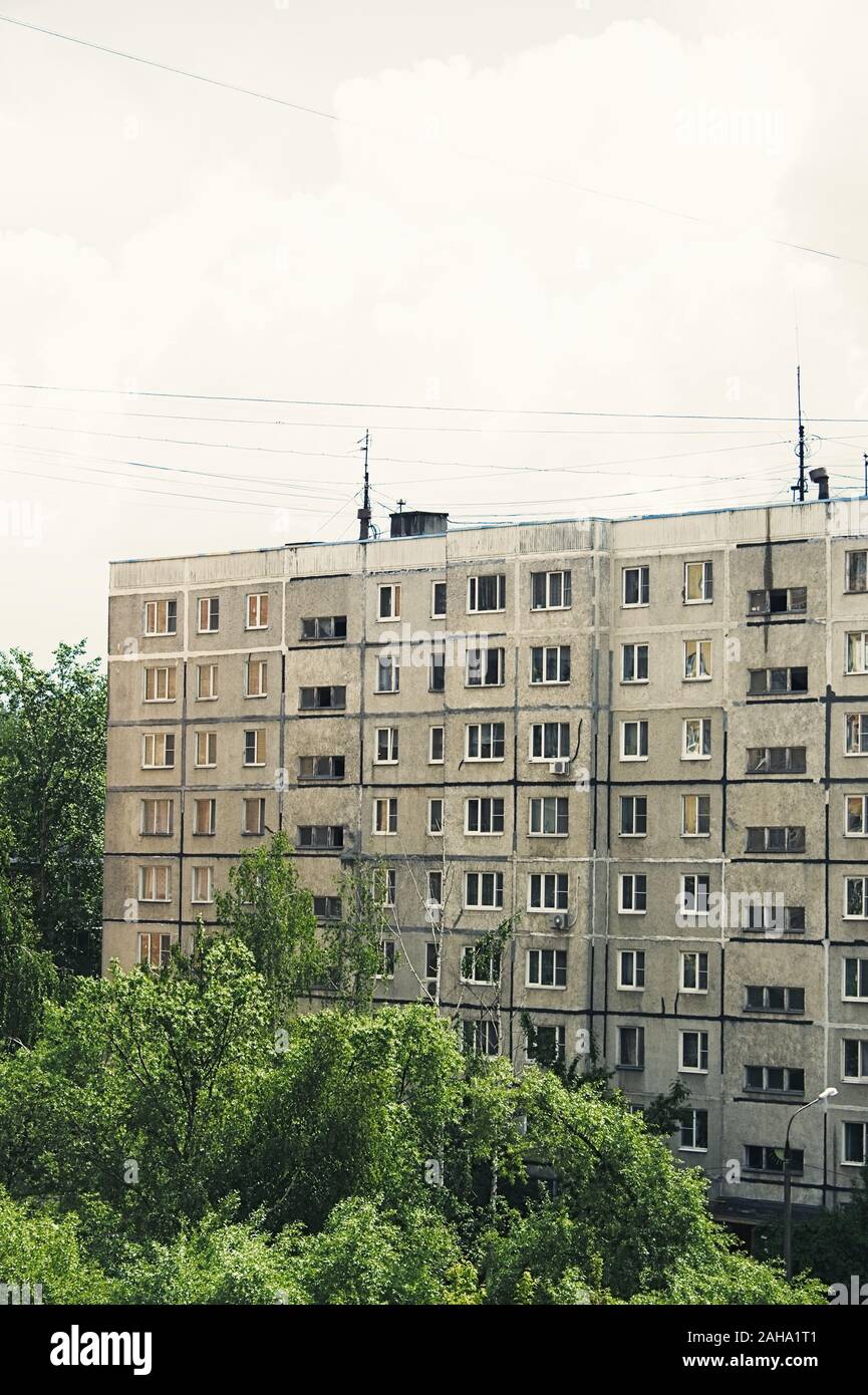 Gray facade of old multi-storey residential building from USSR times in ...