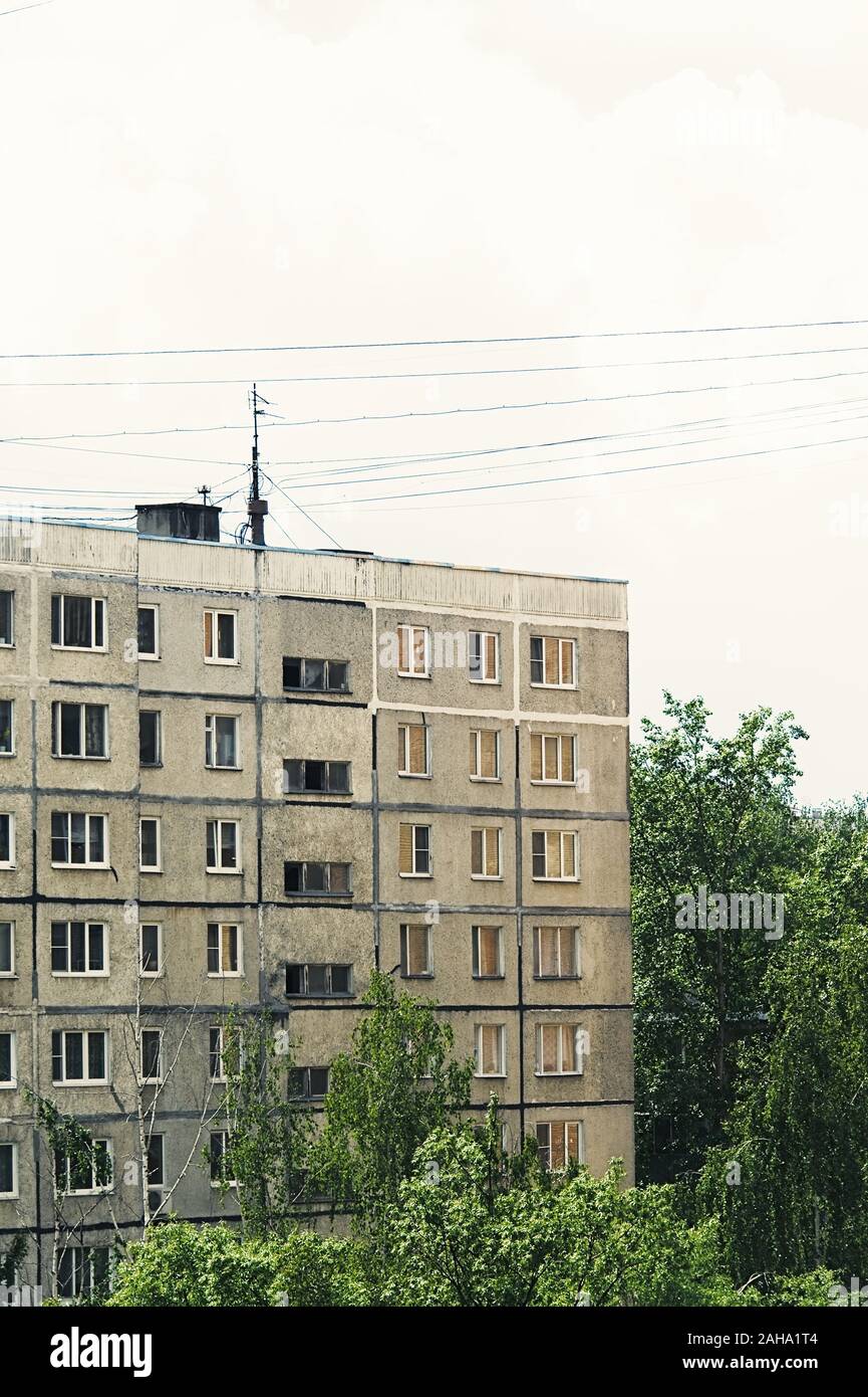Gray facade of old multi-storey residential building from USSR times in ...