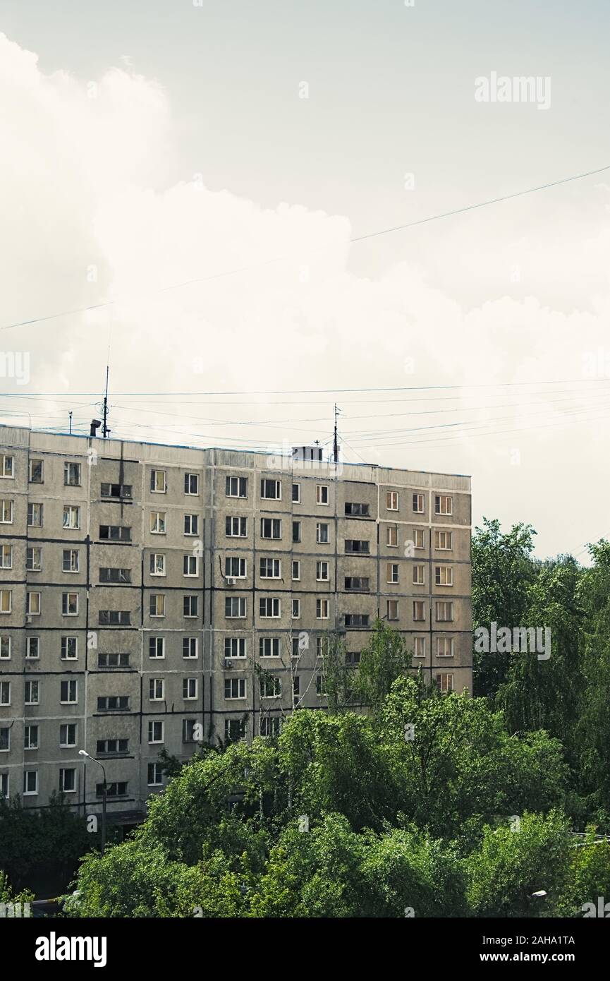 Gray facade of old multi-storey residential building from USSR times in ...