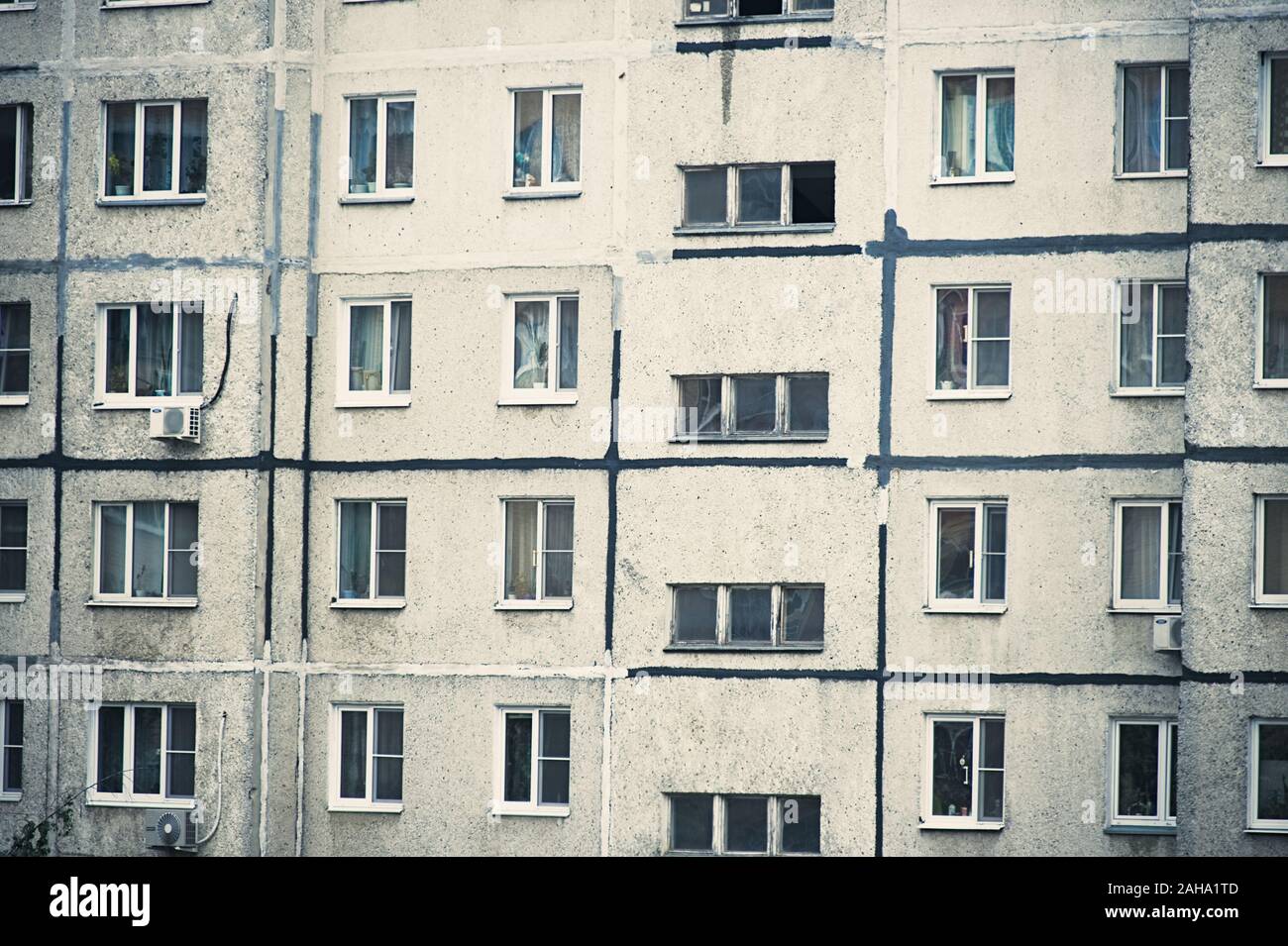 Gray facade of old multi-storey residential building from USSR times in ...