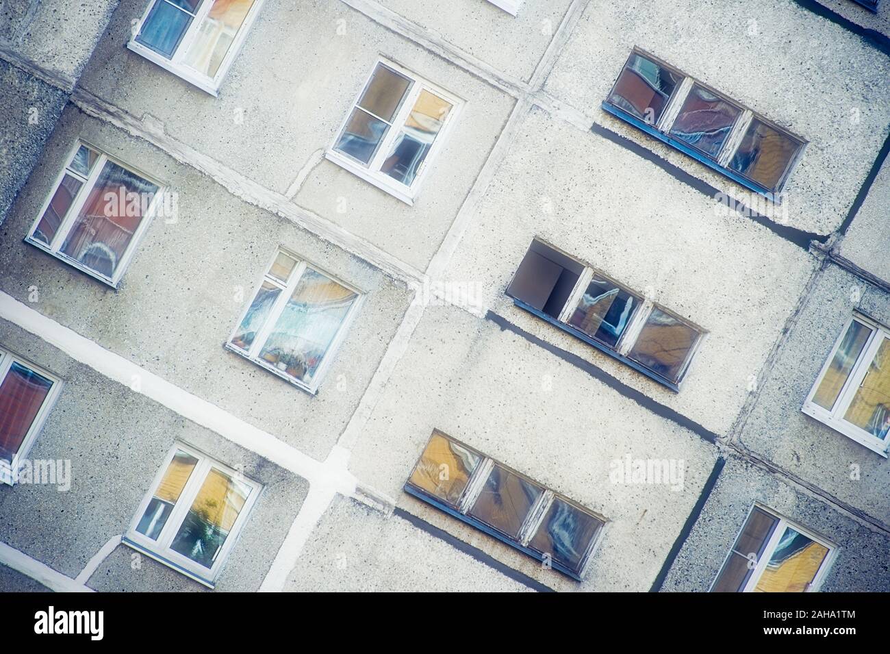 Gray facade of old multi-storey residential building from USSR times in ...