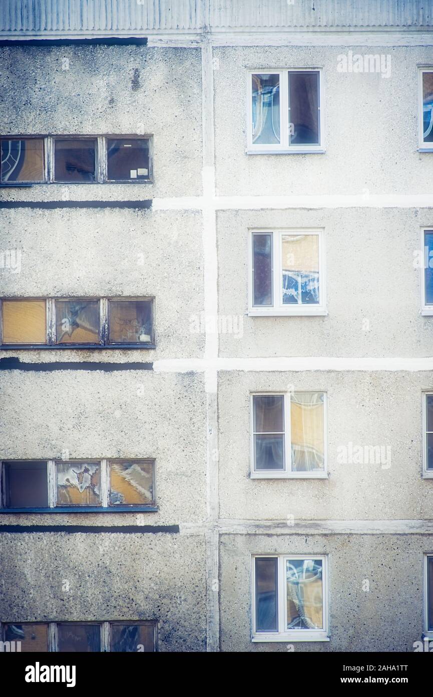 Gray facade of old multi-storey residential building from USSR times in ...